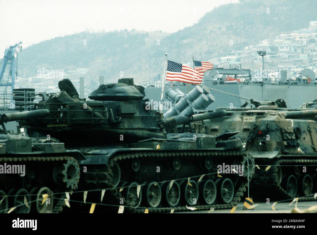 M-60 tanks destined for exercise Team Spirit '89 line the dock at the U ...