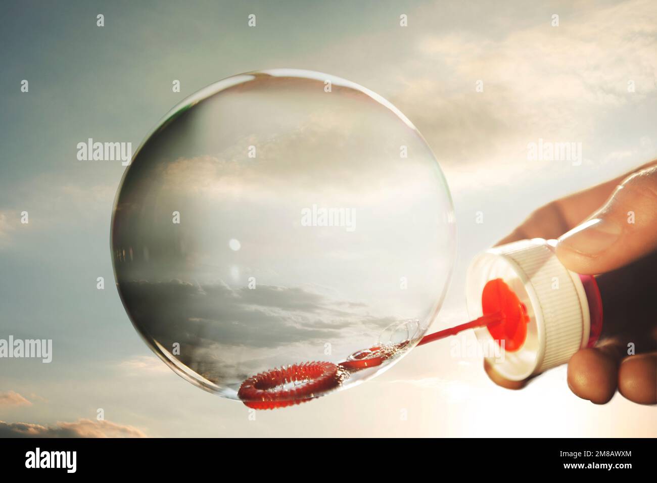 soap bubble contains a piece of sky, concept of fragility, freedom, fun ...