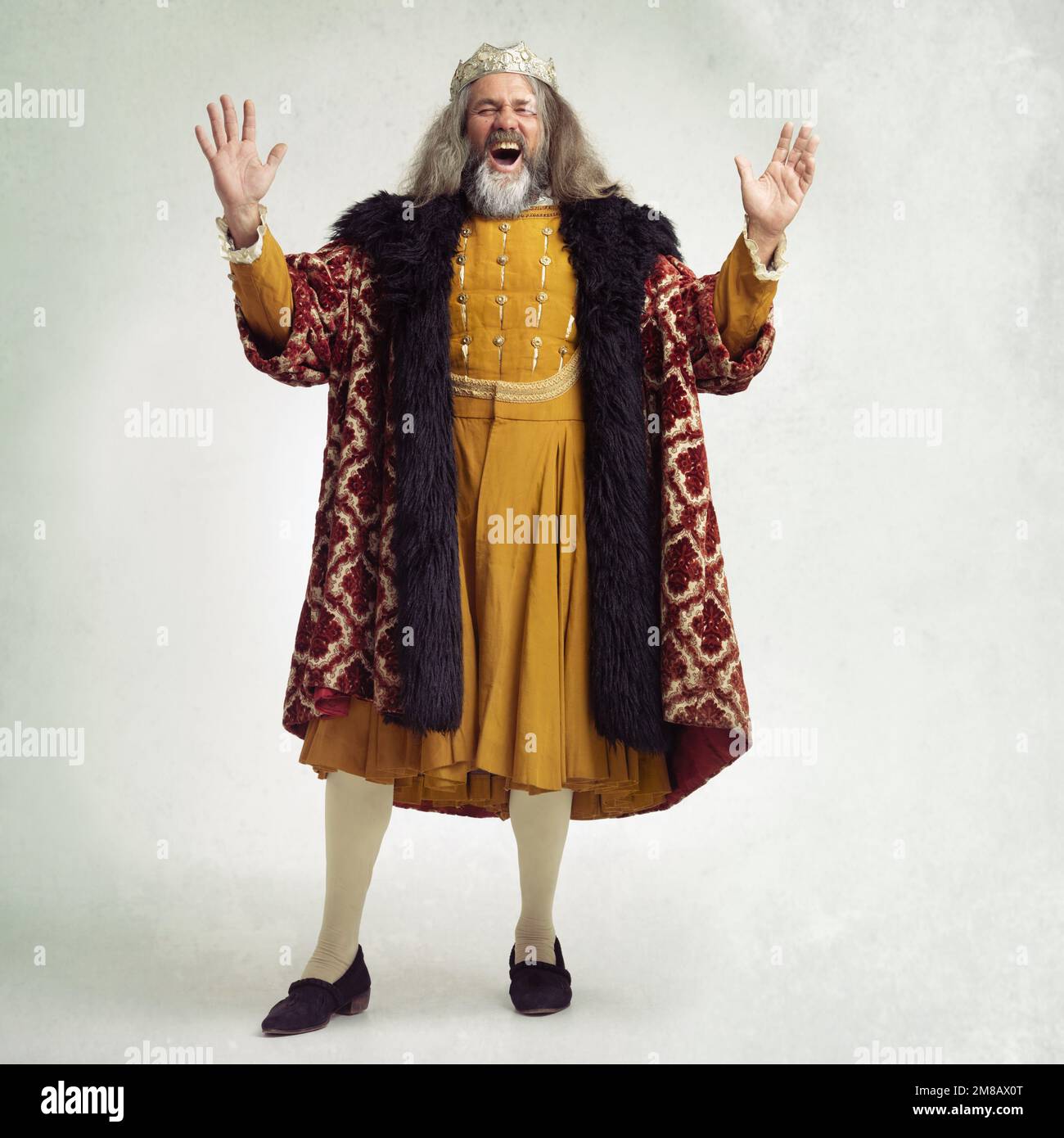 Ancient king man, screaming and studio with laugh, funny and ...
