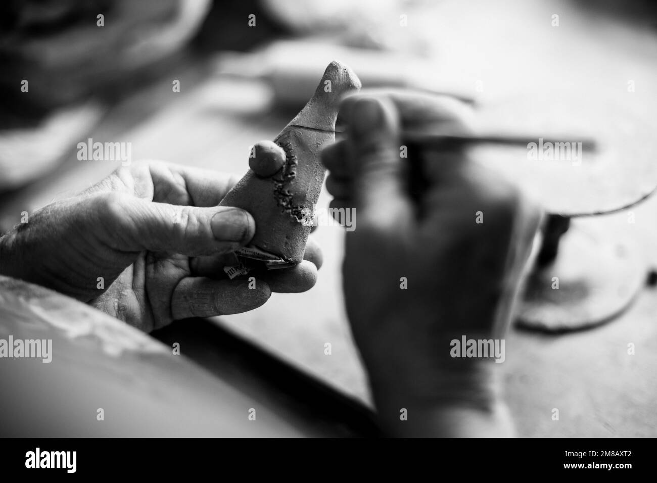 Woman hand potter making clay Black and White Stock Photos & Images - Alamy