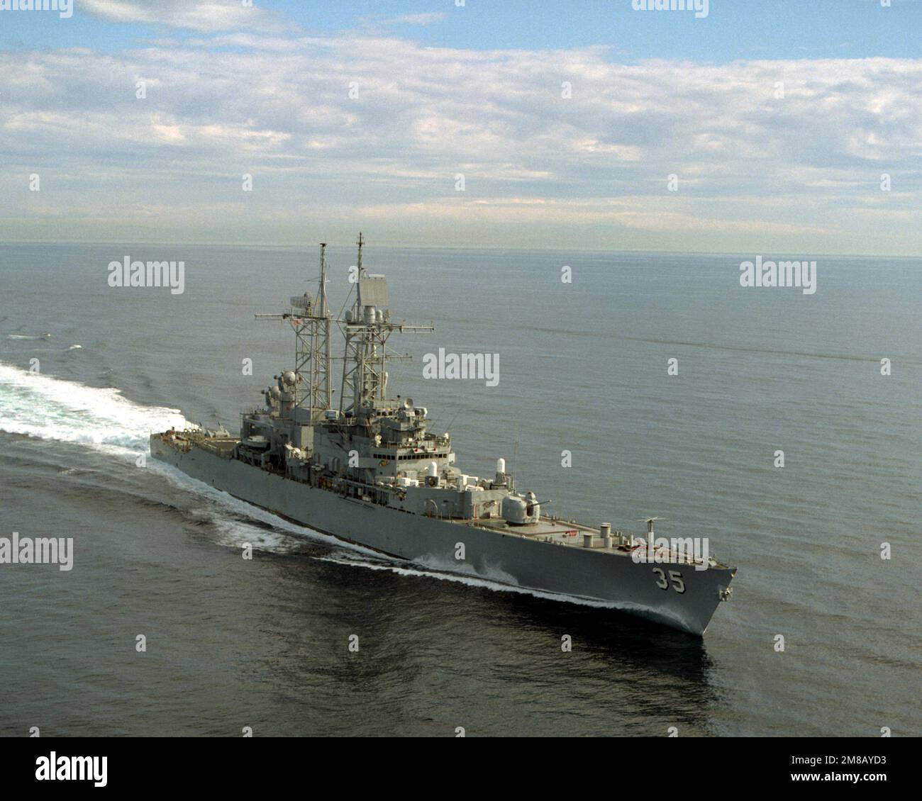 A starboard bow view of the nuclear-powered guided missile cruiser USS ...