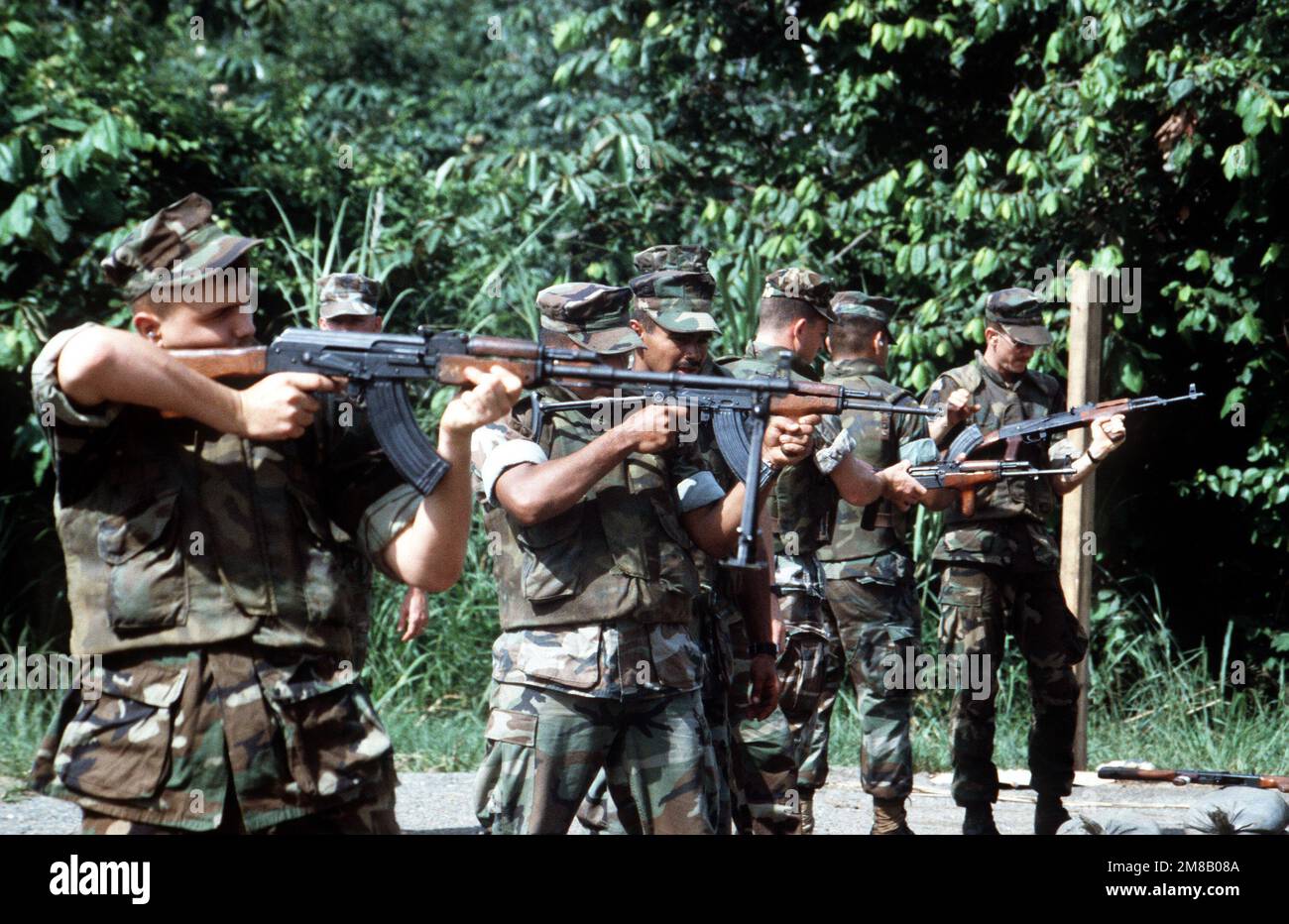 Marines fire Soviet-made weapons during a familiarization class. The ...