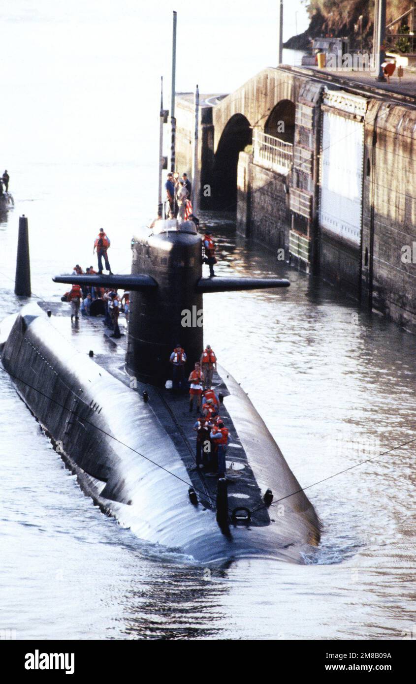 Crewmen stand on the deck of a US Navy Lafayette class nuclear-powered ...