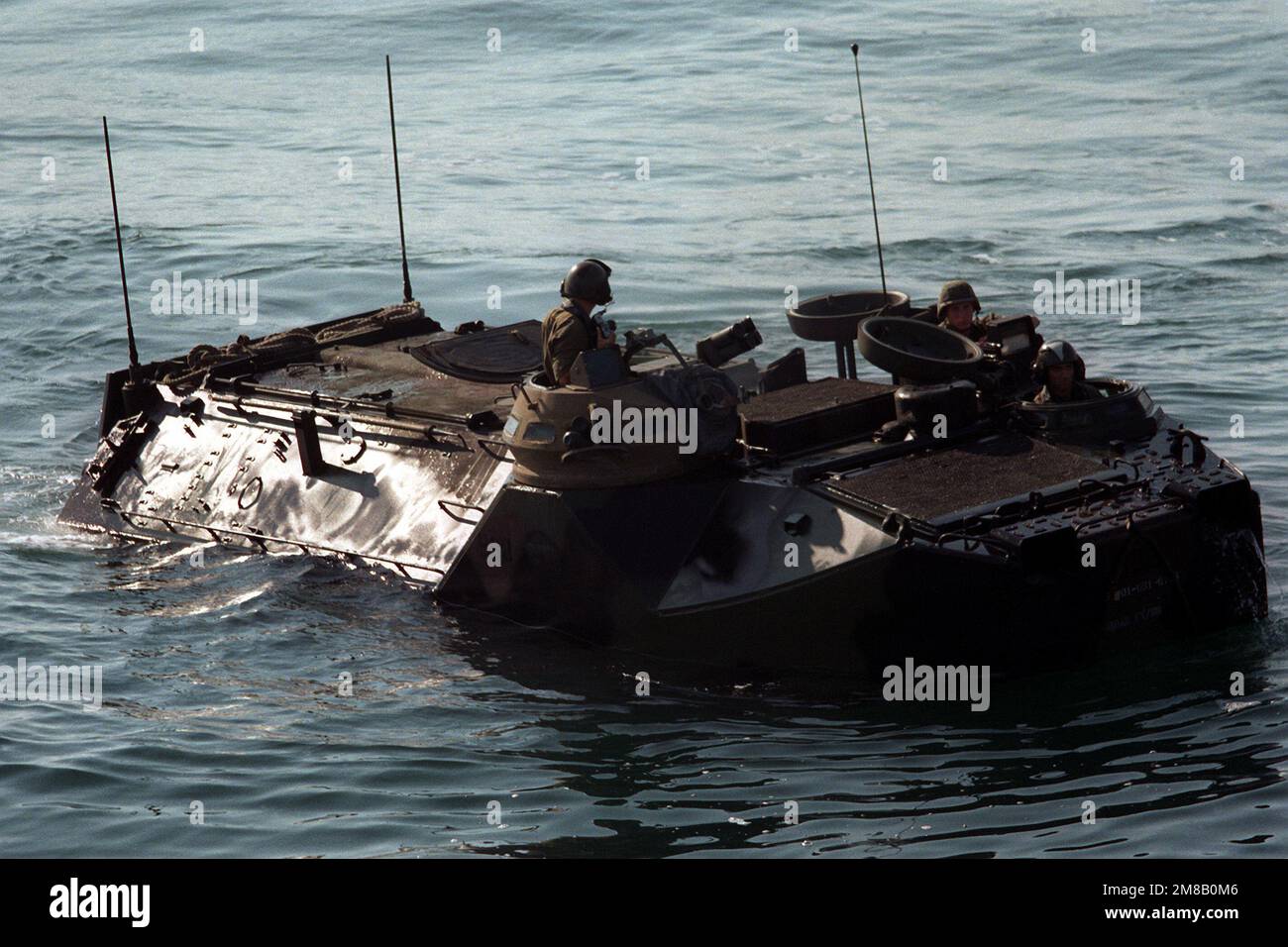 An AAVP-7 assault amphibian vehicle prepares to enter the stern gate of ...