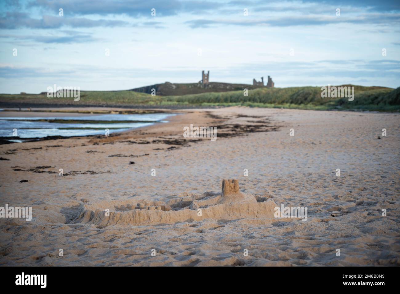 Dunstanburgh beach hi-res stock photography and images - Alamy