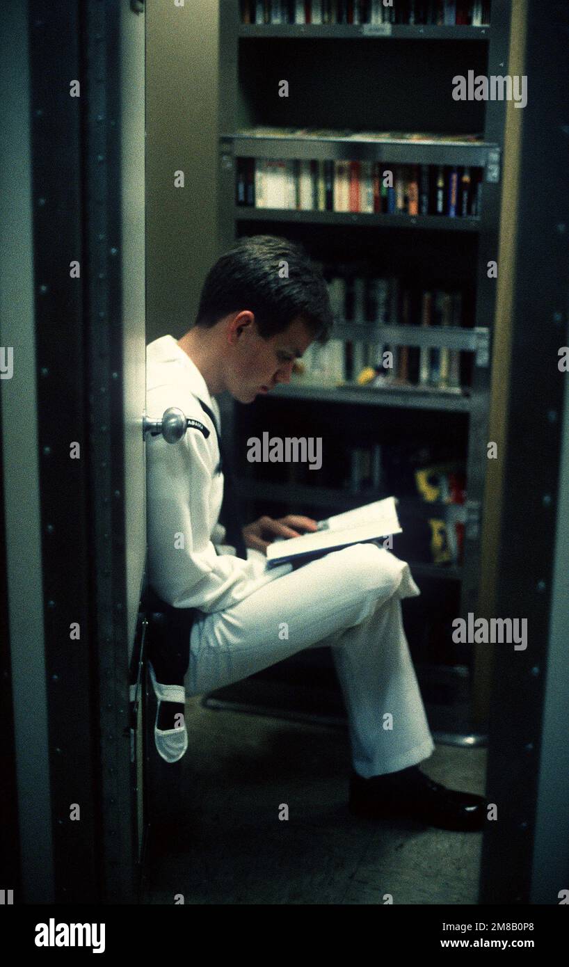 A crewman aboard the nuclear-powered strategic missile submarine USS ...