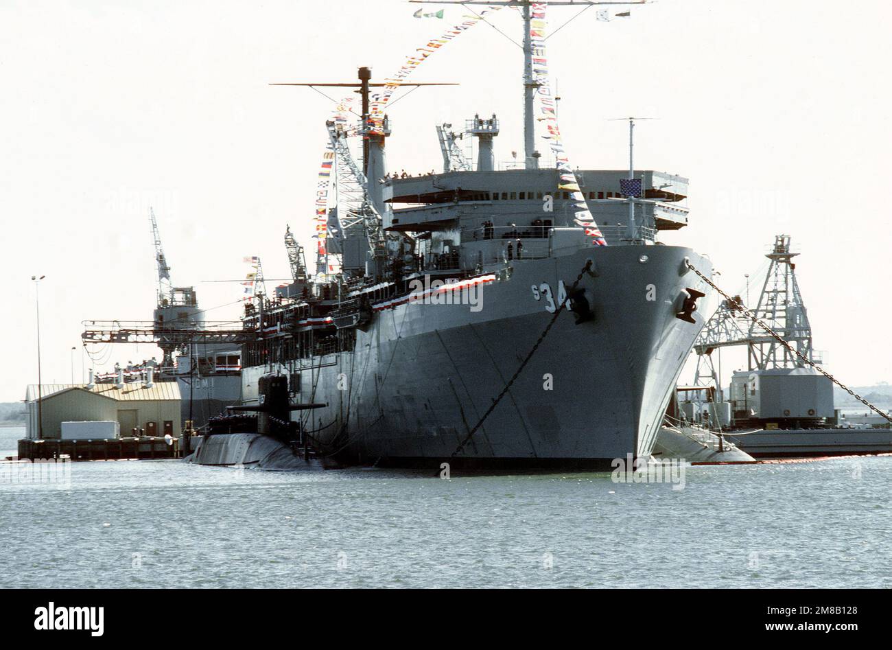 Sailors manning the rails aboard the nuclear-powered strategic missile ...