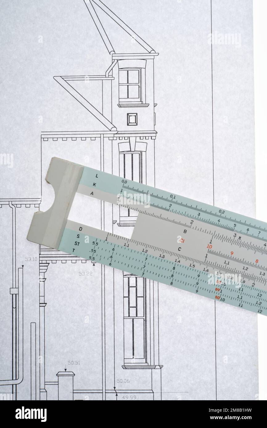 Architects drawings with a slide ruler. An old fashioned way to make ... Architects drawings with a slide ruler. An old fashioned way to make ...