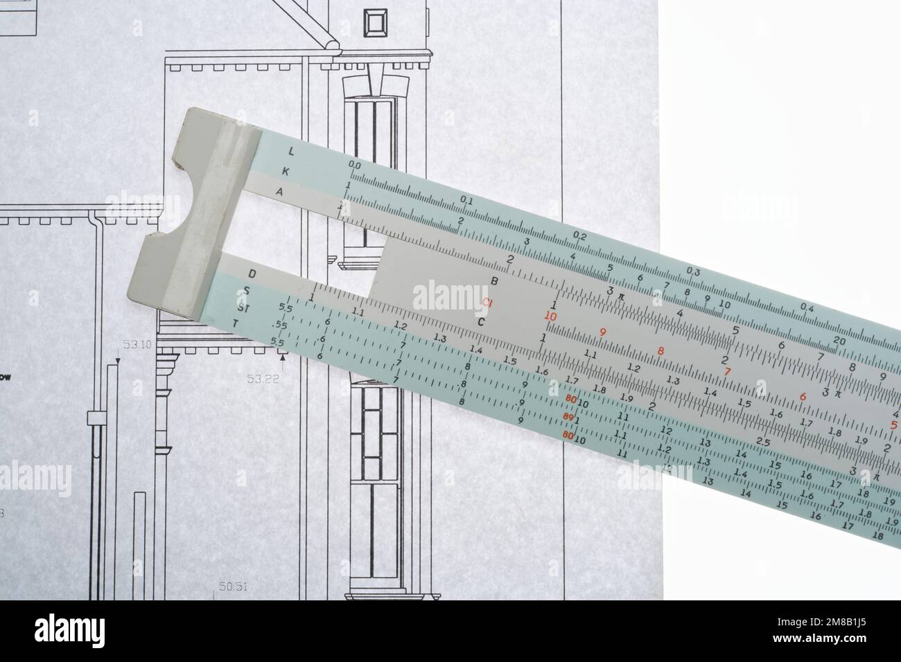Architects drawings with a slide ruler. An old fashioned way to make ... Architects drawings with a slide ruler. An old fashioned way to make ...