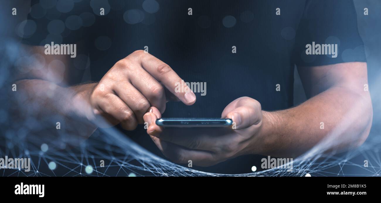 male hands with cell phone, smart phone, surrounded by virtual digital ...