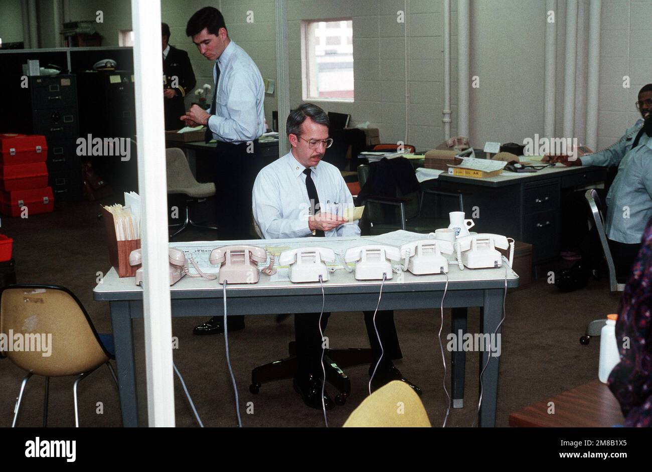 Armed Forces Inaugural Committee members man the headquarters during ...