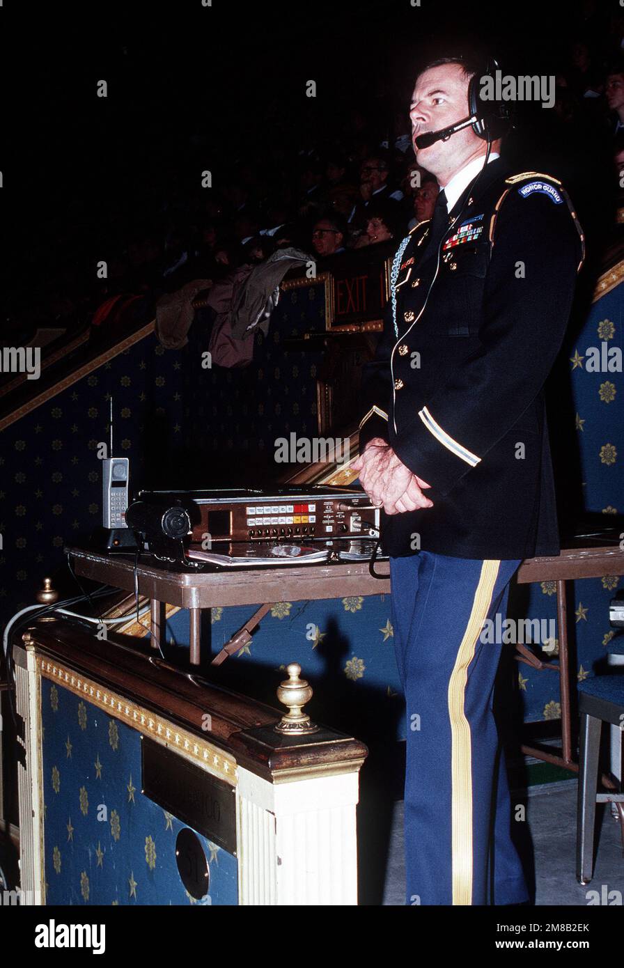An officer of the 3rd Infantry (The Old Guard) monitors a ...