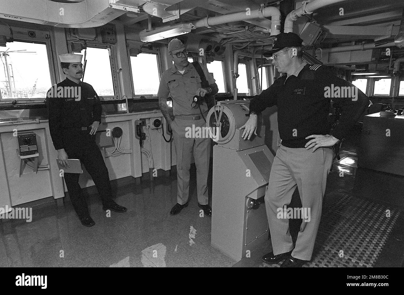 The commanding officer of the destroyer tender USS ACADIA (AD-42 ...