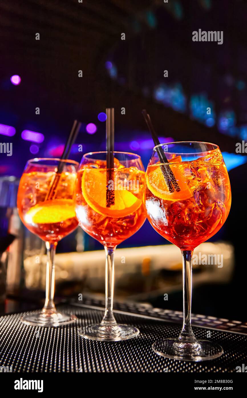 Aperol Spritz cocktail on bar counter in the night club Stock Photo - Alamy