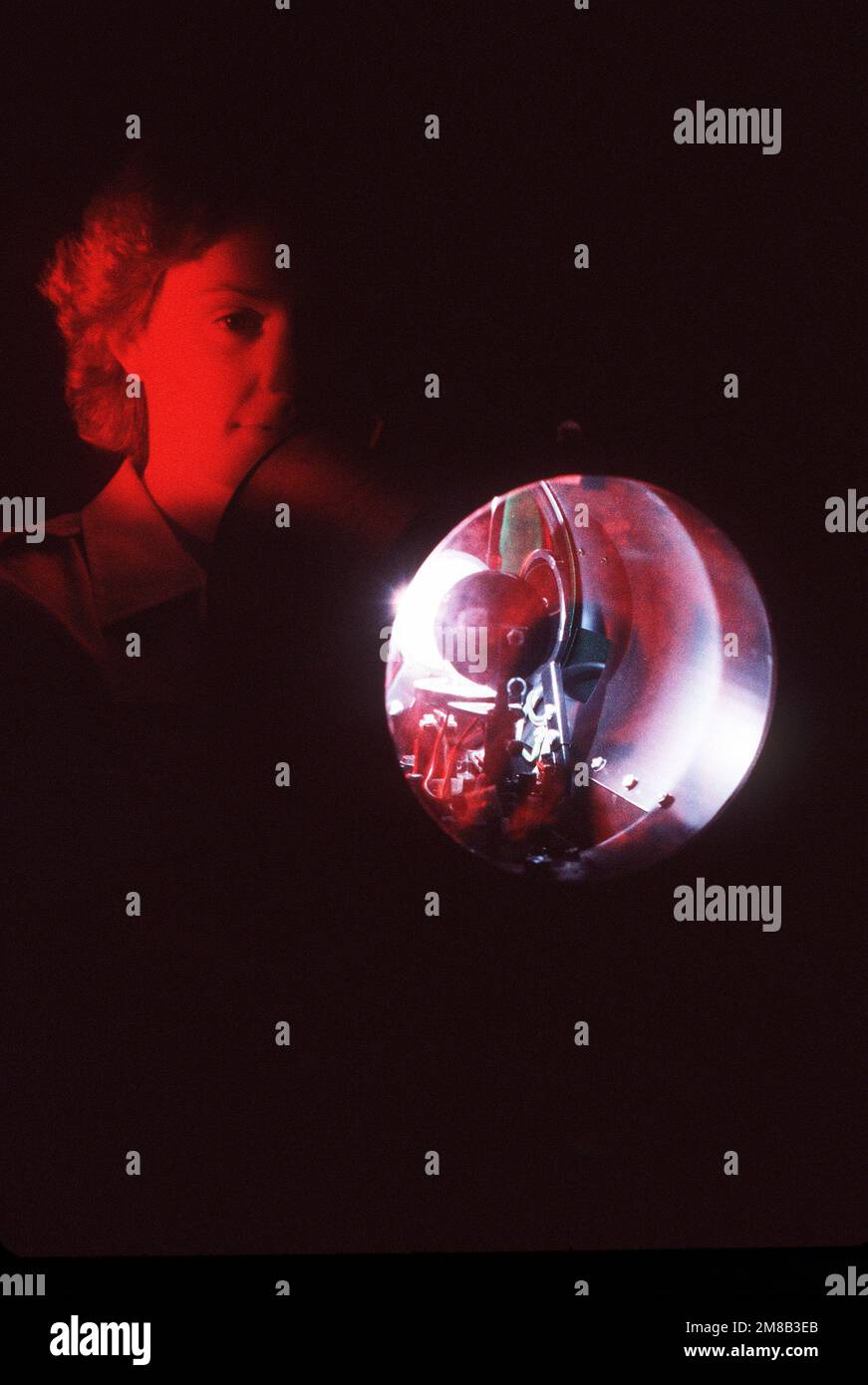 STAFF SGT. Lisa Birkemose operates a control tower light signal gun to ...