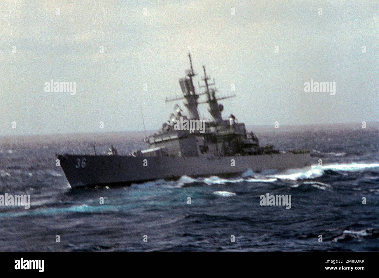 A port bow view of the nuclear-powered guided missile cruiser USS CALIFORNIA (CGN-36) underway ...