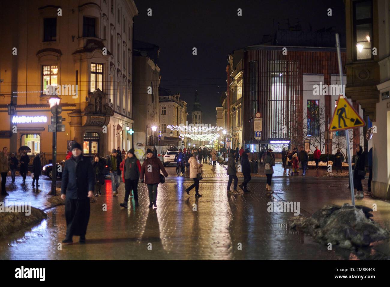 People in the evening on the streets of Krakow during Christmas Stock ...
