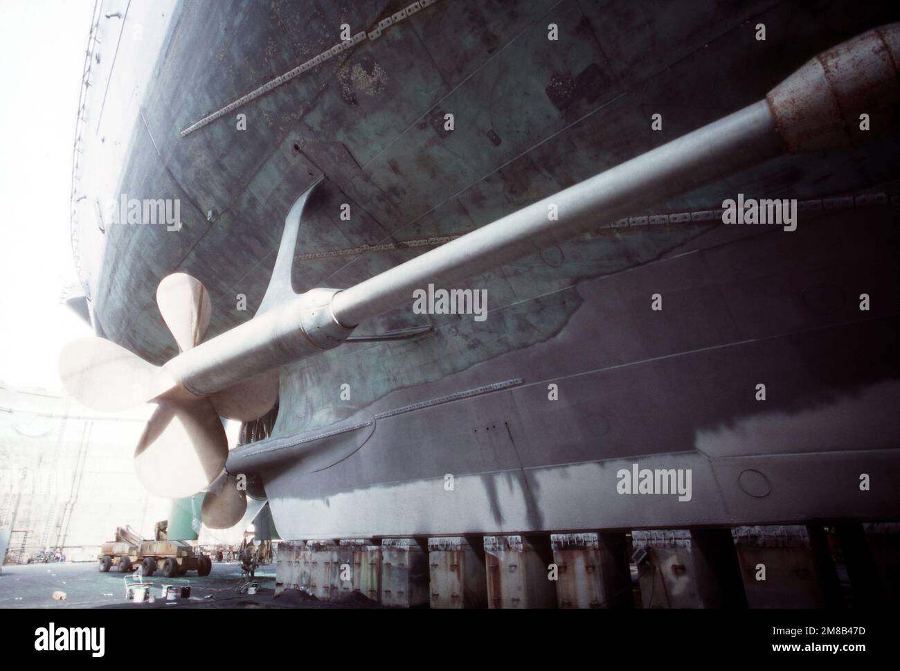 A view of the outboard starboard propeller shaft and propeller of the ...