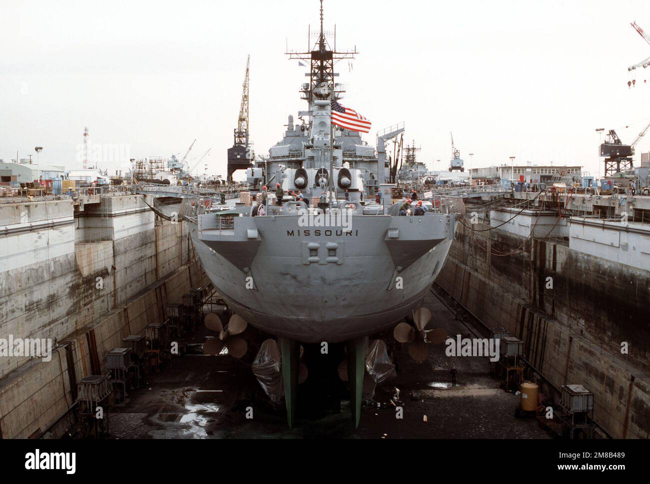 A stern view of the battleship USS MISSOURI (BB-63) as it lies in dry ...