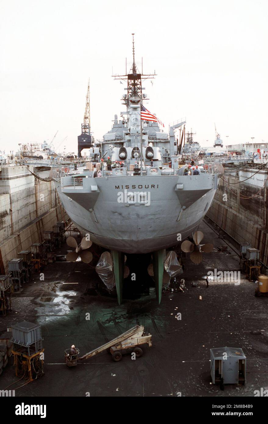 A stern view of the battleship USS MISSOURI (BB-63) as it lies in dry ...