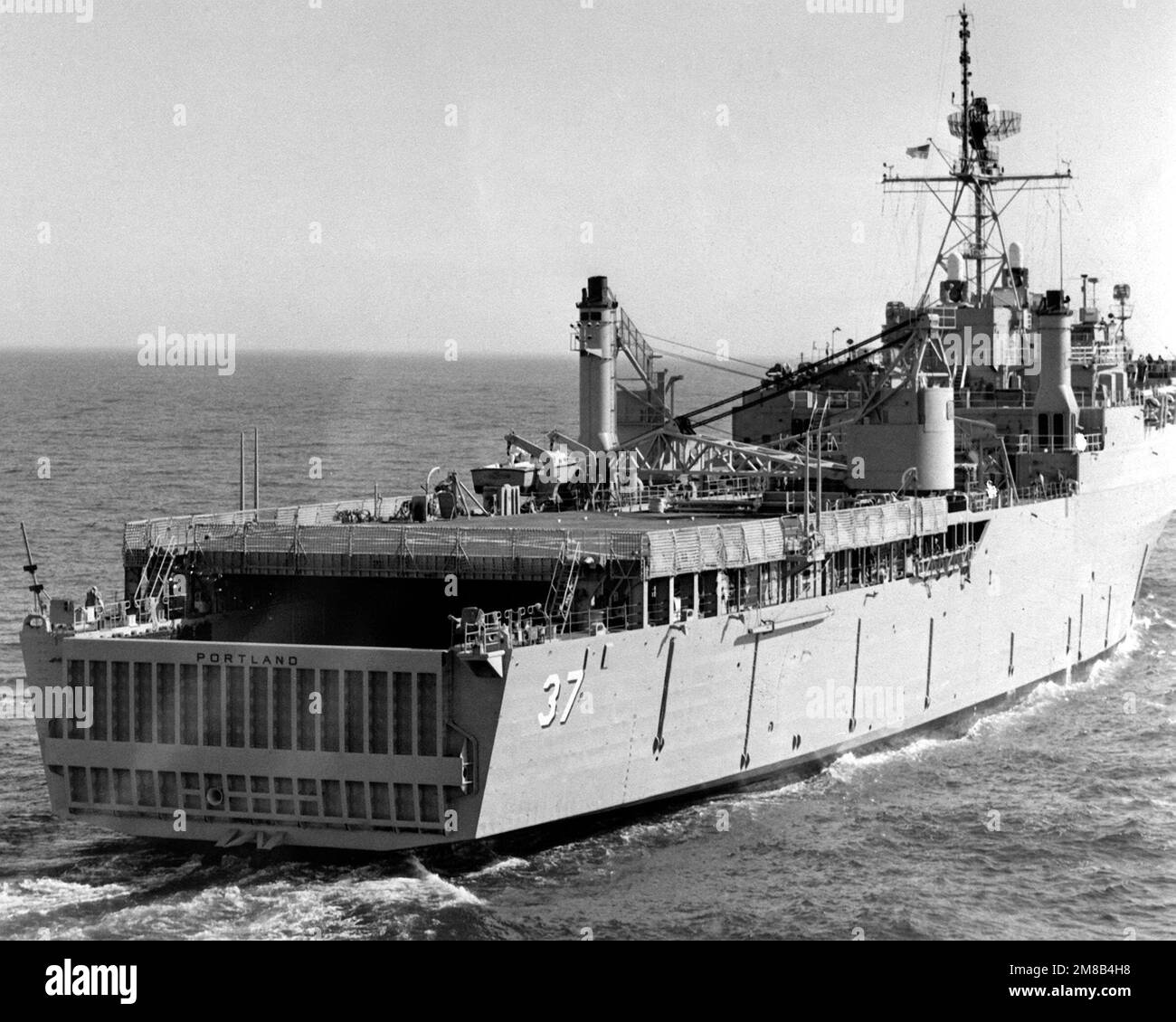 A starboard quarter view of the dock landing ship USS PORTLAND (LSD-37 ...