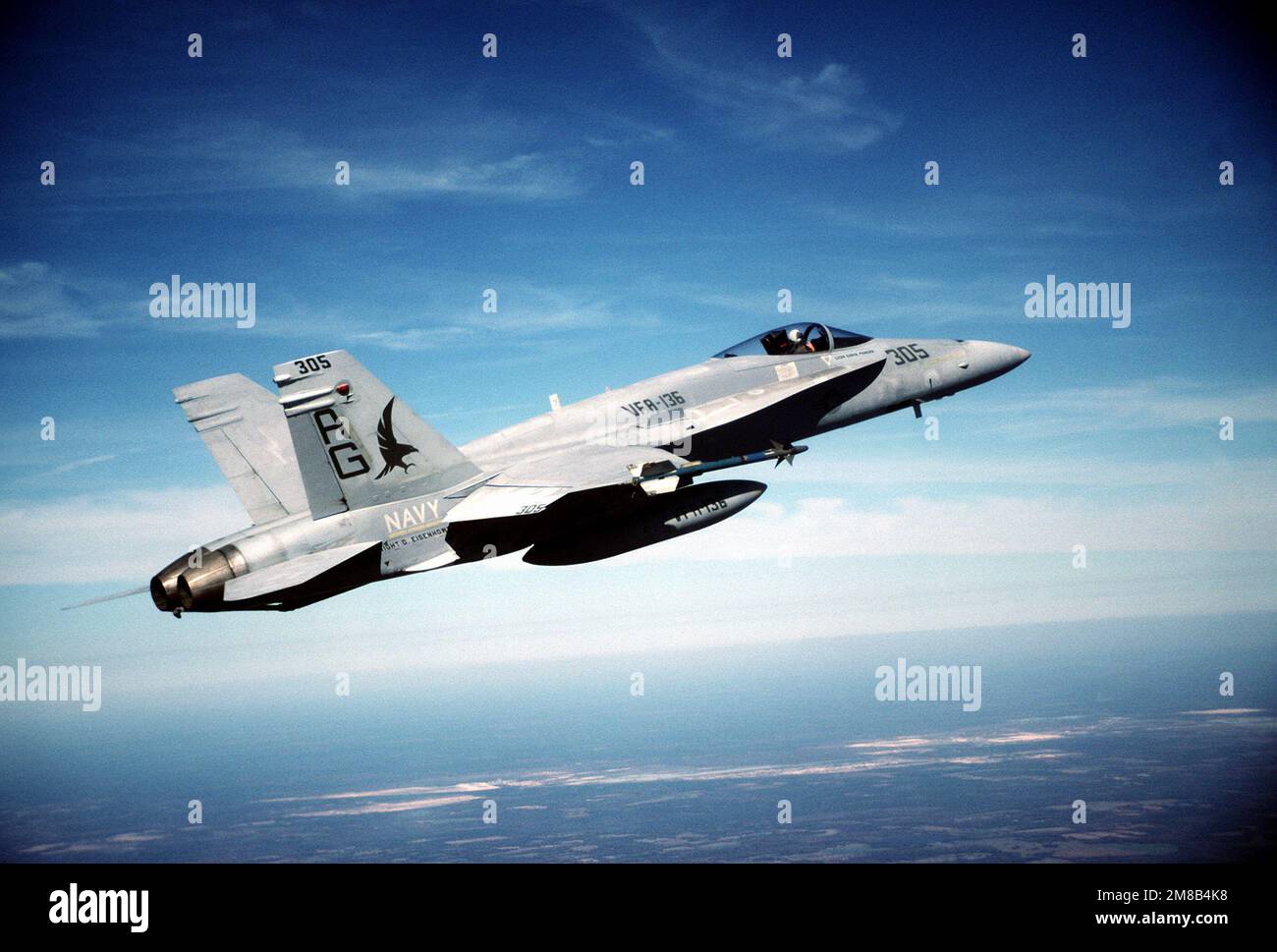 An air-to-air right side view of a Strike Fighter Squadron 136 (VFA-136 ...