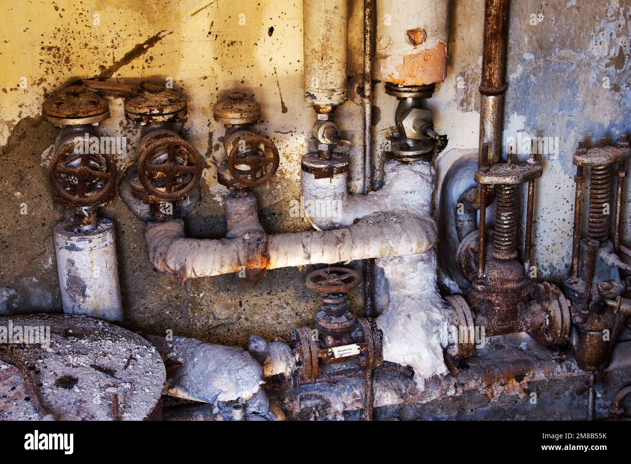 Abandoned machine of rusty pipes and dirty valves with interesting ...