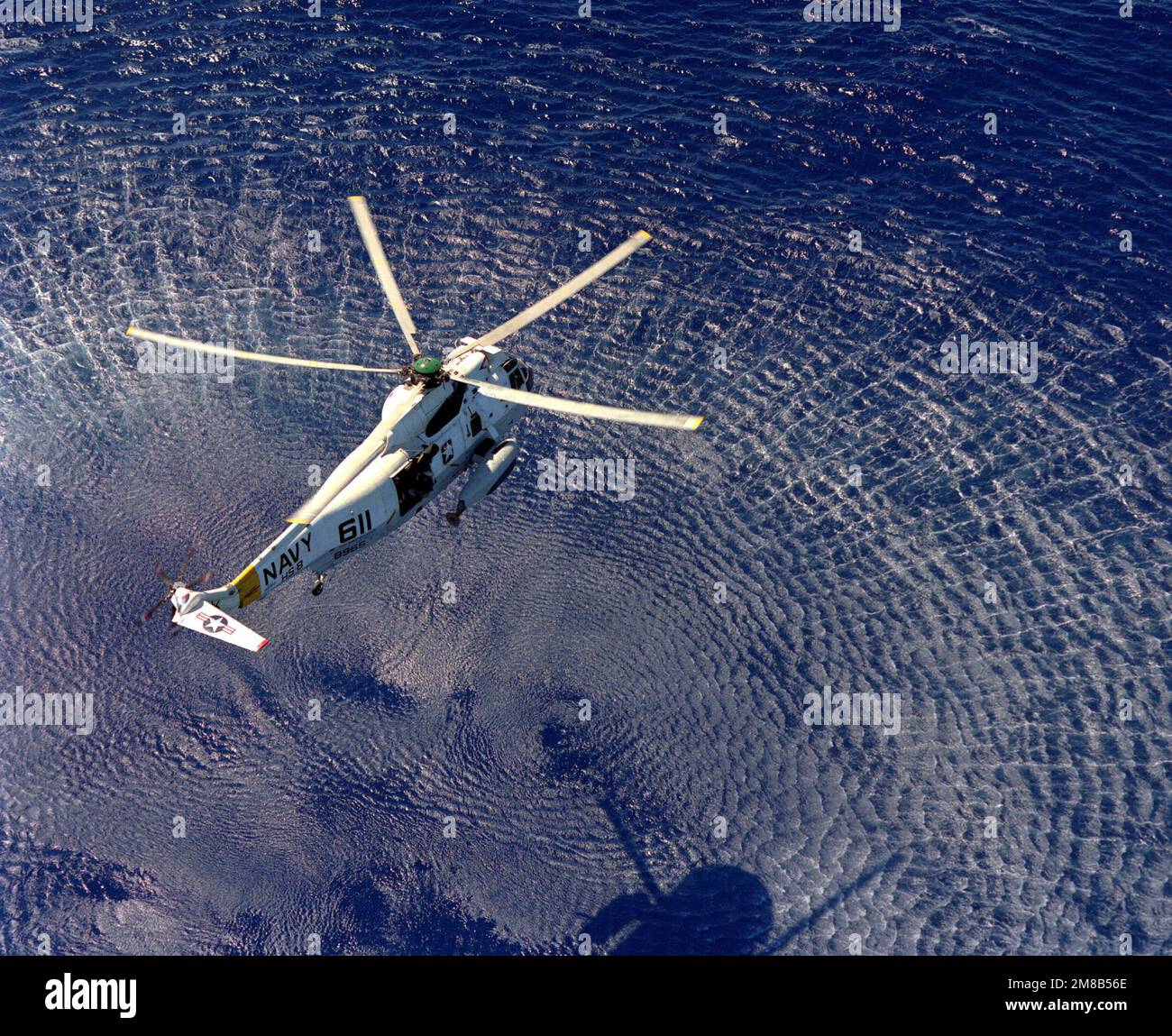 A crew member aboard a Helicopter Anti-submarine Squadron 8 (HS-8) SH ...