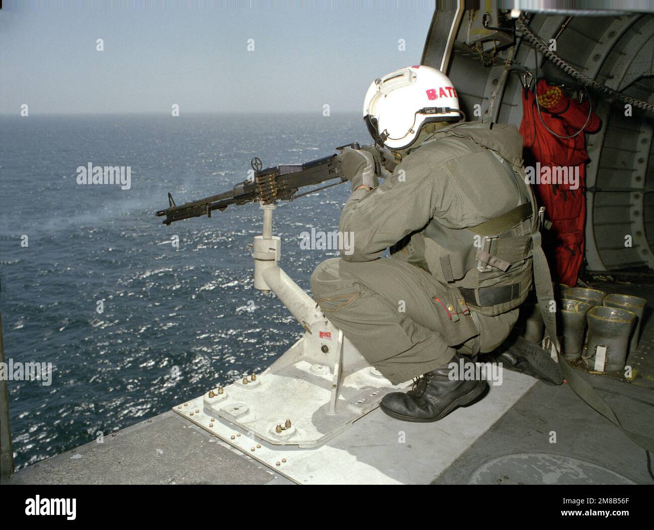 A crew member aboard a Helicopter Anti-submarine Squadron 8 (HS-8) SH ...