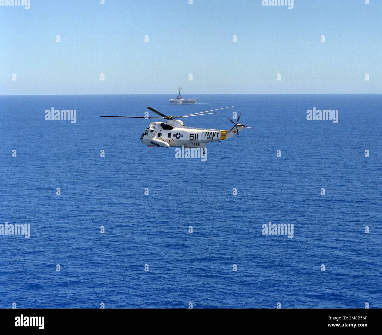 A crew member aboard a Helicopter Anti-submarine Squadron 8 (HS-8) SH ...