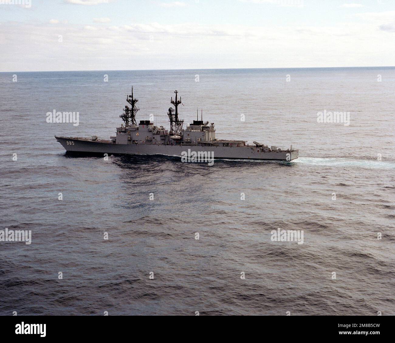 A port beam view of the destroyer USS CUSHING (DD 985) underway near ...