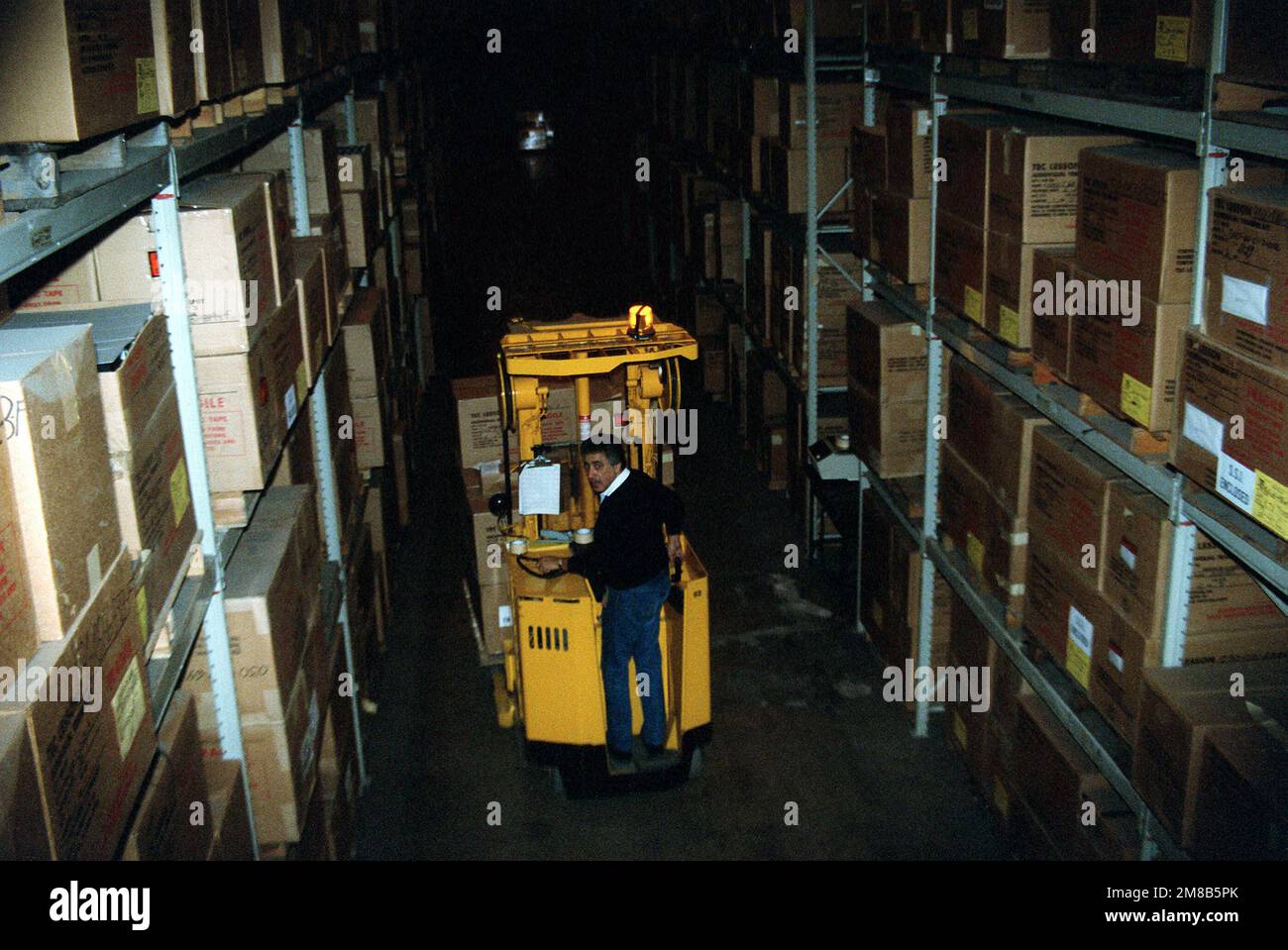 Joseph Carmella uses a forklift to remove material from the bulk ...