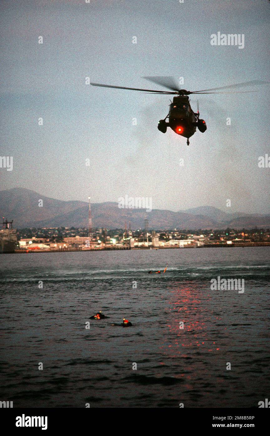 Having placed a rescue harness around a "downed Pilot," a search and ...