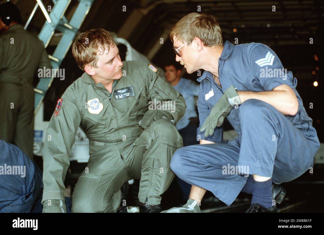 SGT Mark E. Ransom, 22nd Military Airlift Squadron loadmaster, and SGT ...