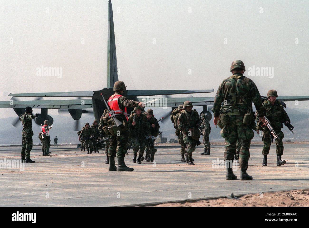 Members of 5th Bn., 14th Inf., 25th Inf. Div. (Light), disembark from a ...