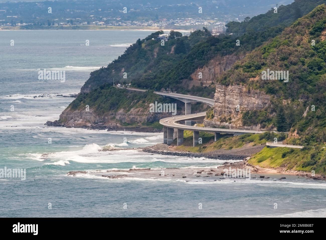 Sea Cliff Bridge, a balanced cantilever bridge built in 2005, curves ...