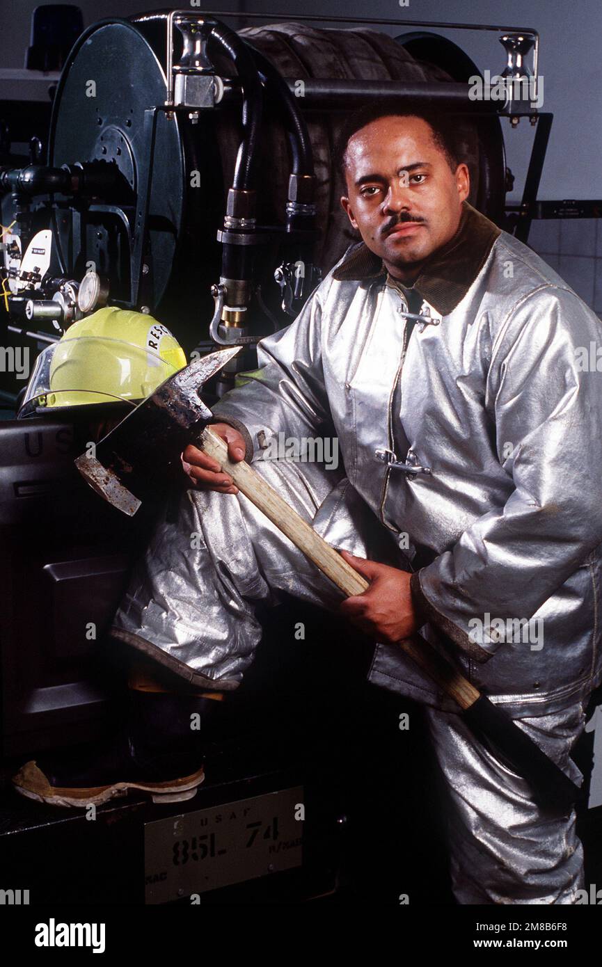 SRA David Bryant, U.S. Air Force firefighter, takes a break. Base ...