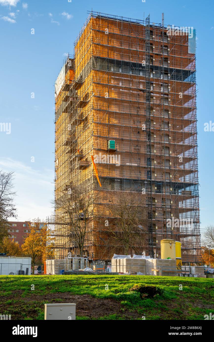 Scaffolding for construction of an apartment building in the ...