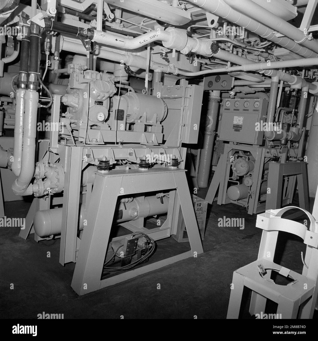A view of auxiliary machinery room No. 1 aboard the guided missile ...