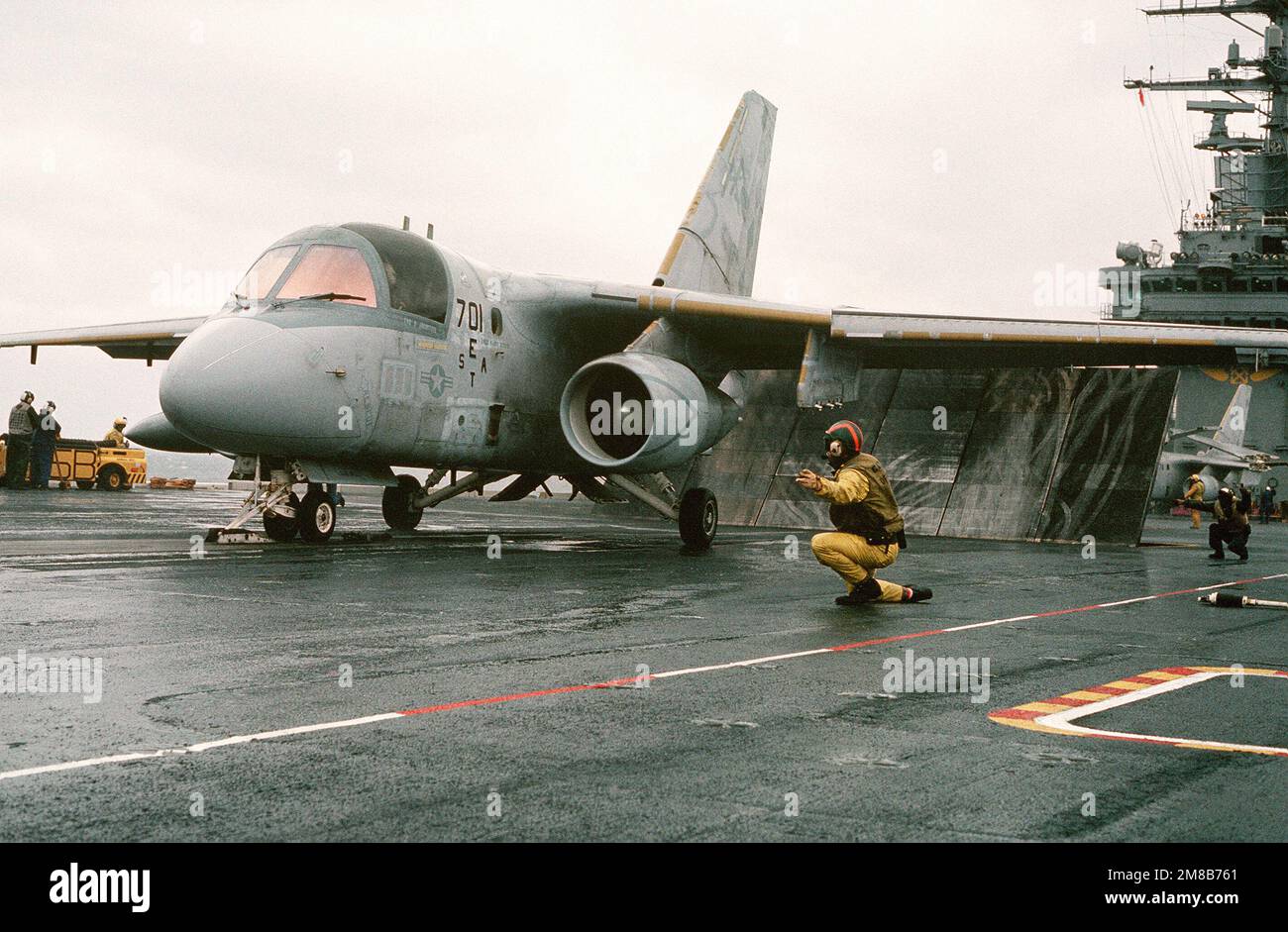 A catapult officer signals for the launch of an Air Anti-submarine ...