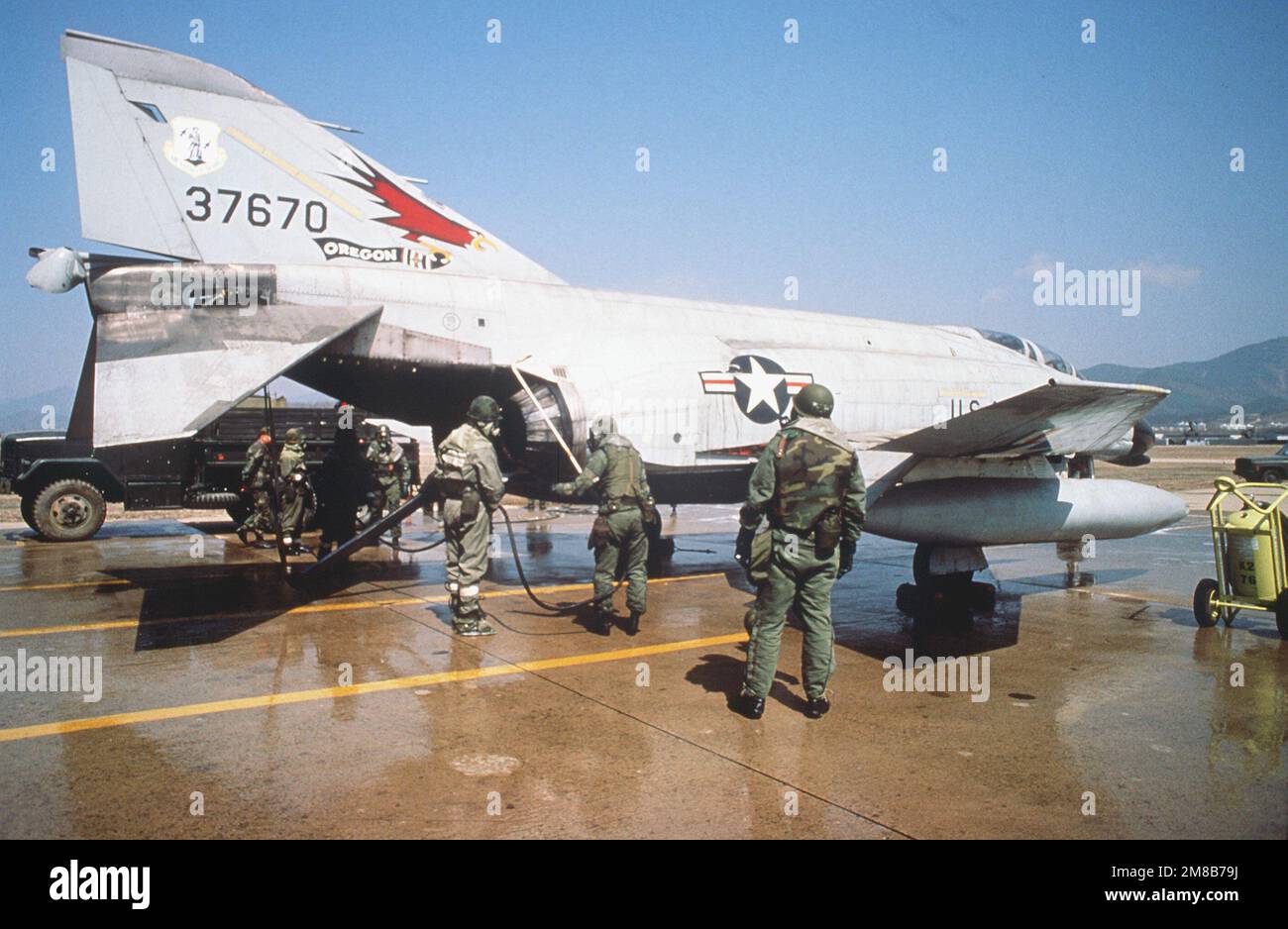 South Korean and American airmen wearing Nuclear-Biological-Chemical ...