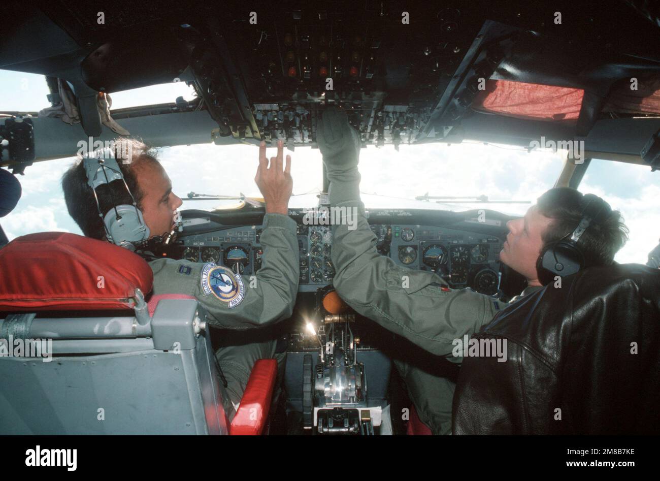 Pilot CPT Kurt Lajala, left, and co-pilot 1LT Steve Hazelfeldt check ...
