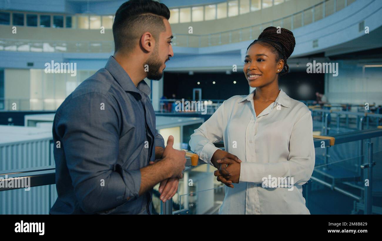 Friendly diverse multiethnic business partners colleagues talking in ...