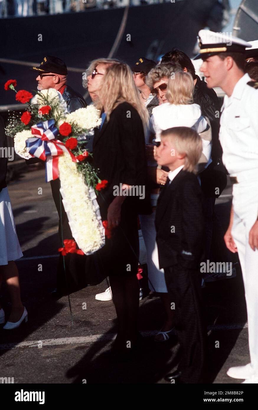 Mourners attend a memorial service for the 47 crew members killed in an ...