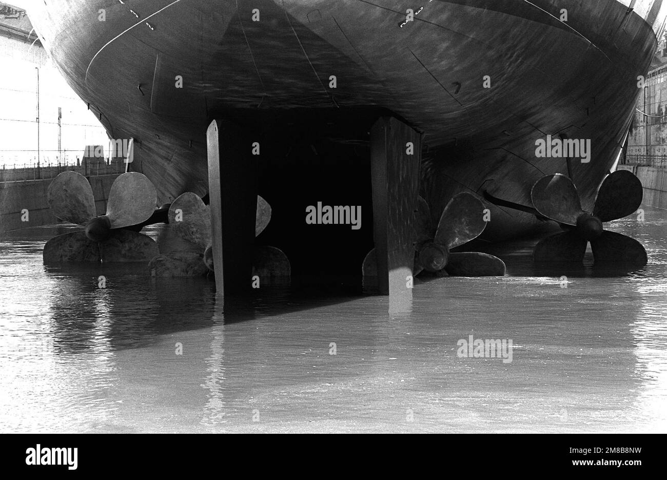 A starboard quarter view of the underside of the battleship USS ...