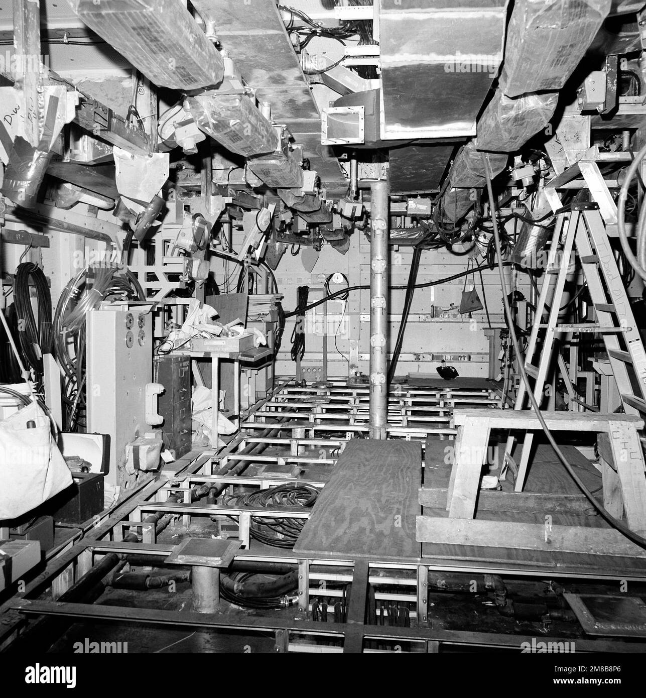 A view of the combat information center on the guided missile cruiser ...