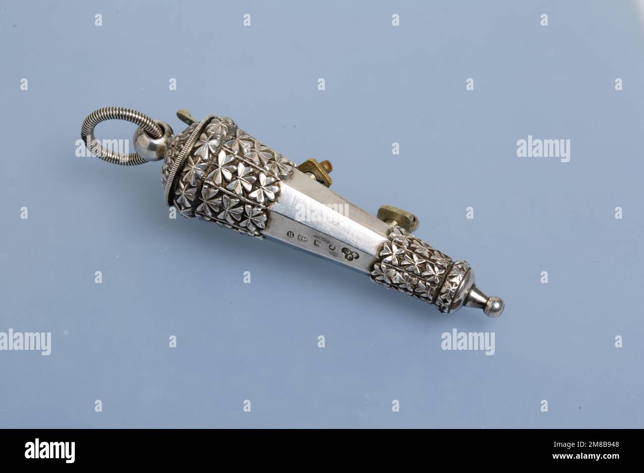 Silver whistle and case with stylised shamrock motifs, issued to the ...