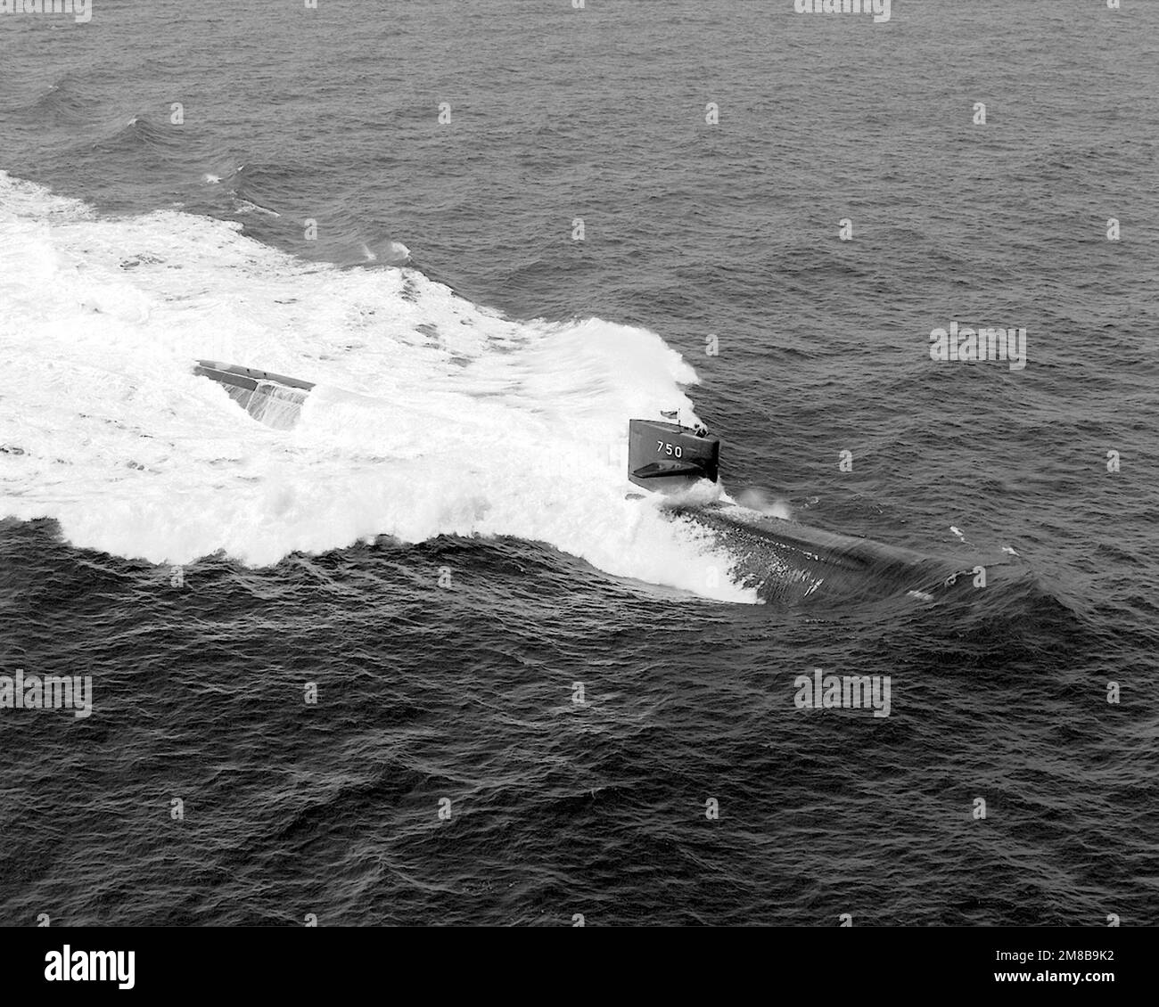 A starboard bow view of the nuclear-powered attack submarine USS ...