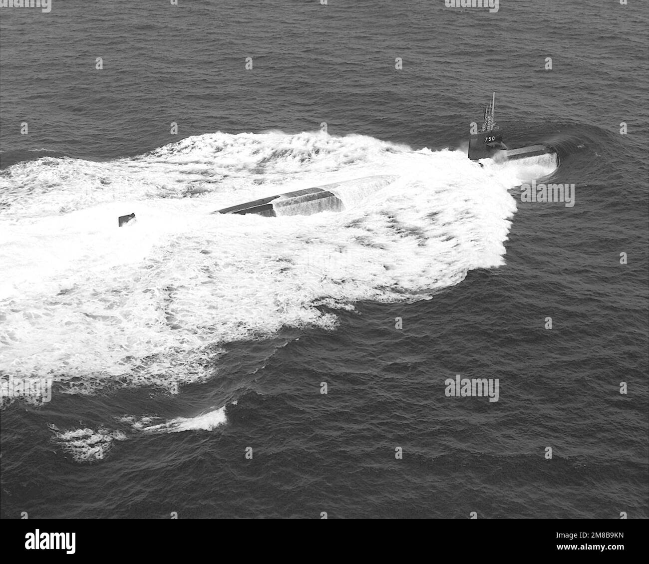 A starboard quarter view of the nuclear-powered attack submarine USS ...