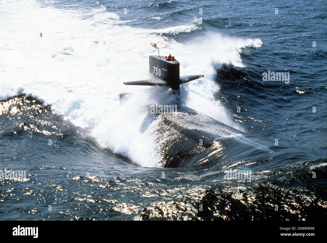 A starboard bow view of the nuclear-powered attack submarine USS ...